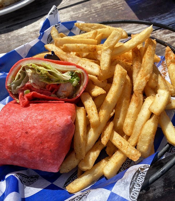 This wrap doesn't just satisfy hunger&mdash;it creates memories wrapped in a vibrant red tortilla with fries that deserve their own fan club.