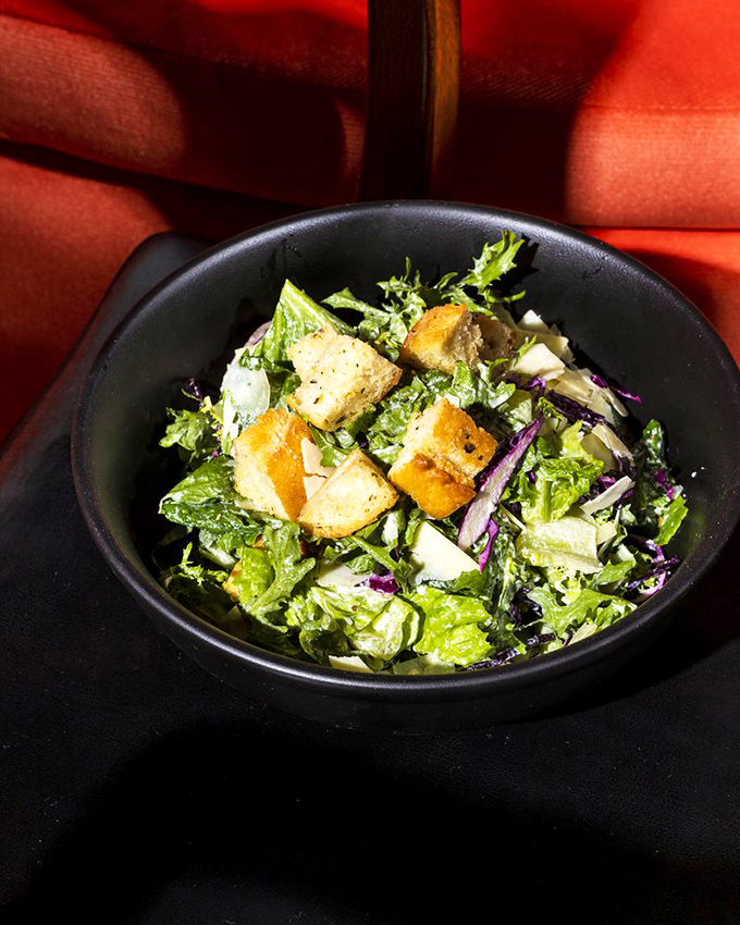 Caesar salad gets the Mercury treatment—crisp romaine, house-made croutons, and a shower of cheese that would make the Roman emperor himself applaud.