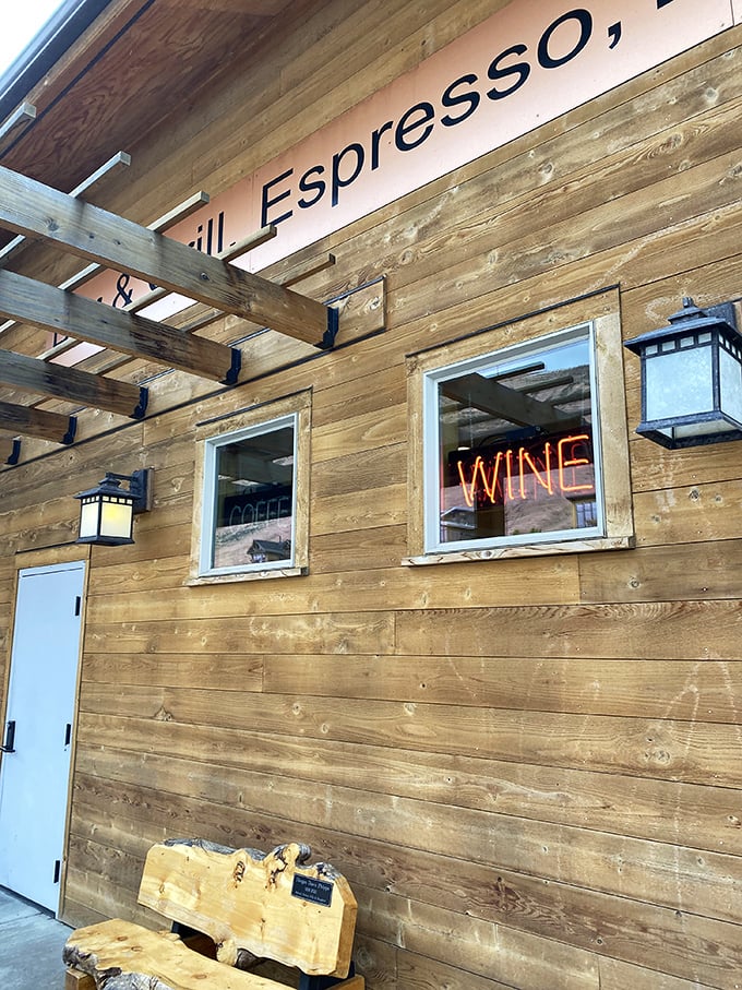 Canyon River Grill's rustic wood exterior suggests hearty meals await inside, possibly involving beef from actual nearby ranches.