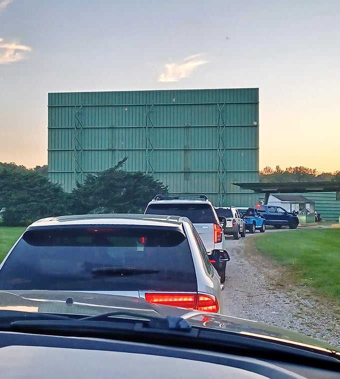 The pilgrimage begins&mdash;cars line up as sunset approaches, each vehicle carrying passengers eager for an evening of big-screen enchantment.