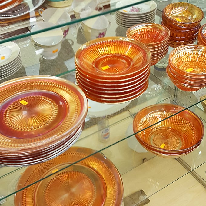 Carnival glass dishes catching light like sunset through honey&mdash;your grandmother would approve of this find.
