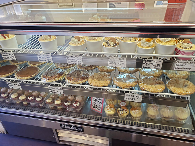The display case that launched a thousand diets&mdash;and broke them all. Each shelf tells a different sweet story waiting to be devoured.