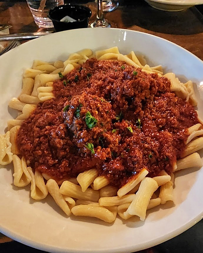 Cavatelli Bolognese that doesn't just sit on the plate—it makes a statement about generations of tradition in every hearty, meaty bite.
