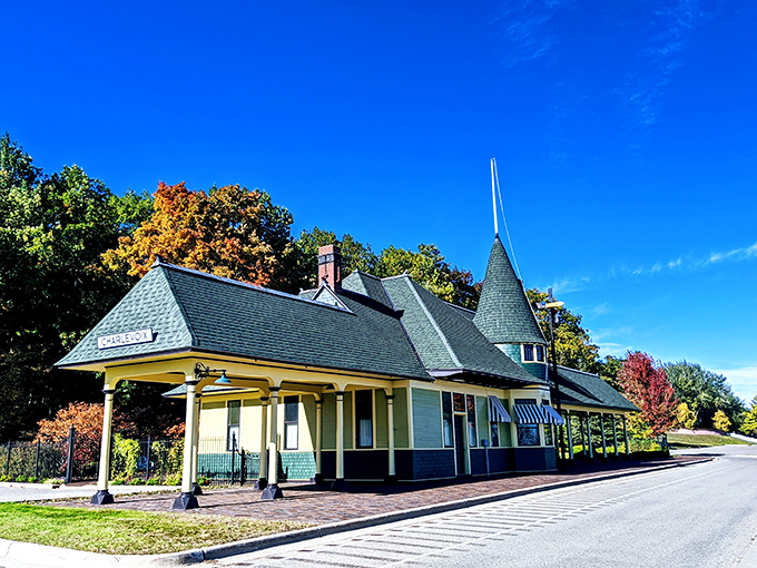 The historic train depot stands as a colorful reminder of Charlevoix's past, now serving new generations of travelers seeking northern Michigan charm.