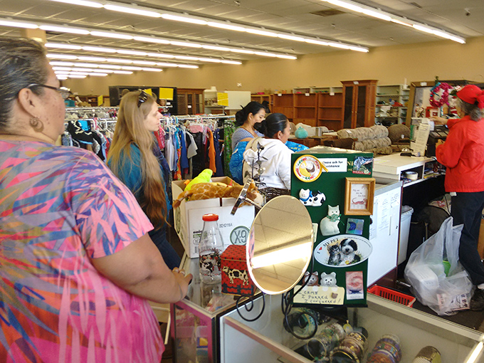The checkout line, where triumphant hunters clutch their finds and exchange knowing glances that say, "Yes, I scored big today too."