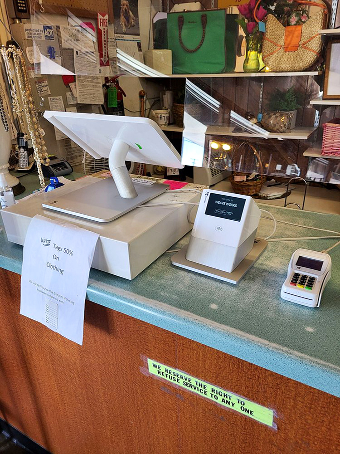 At the checkout counter, a sign reminds shoppers that even in this treasure trove, some basic rules of retail still apply.