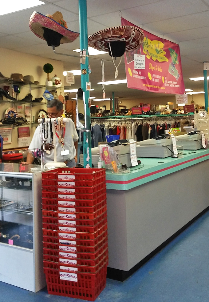 Where retail meets mission. The checkout area reminds shoppers that fashion finds fund vital community health services.