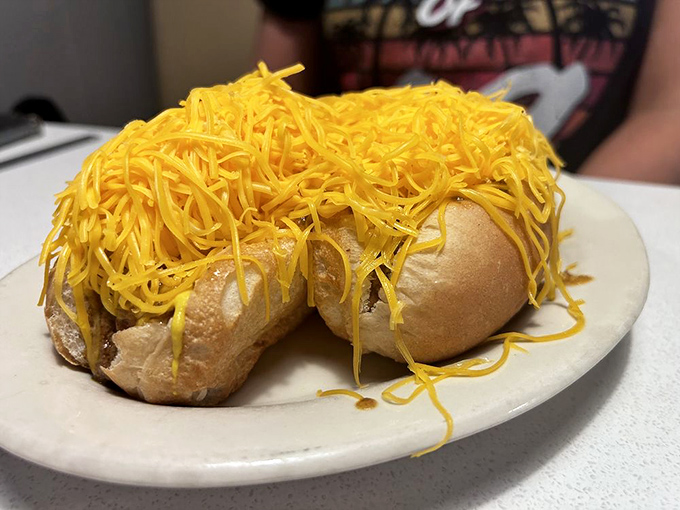 Behold the Cheese Coney in its natural habitat&mdash;a simple hot dog transformed into Cincinnati royalty under a crown of impossibly yellow cheese.
