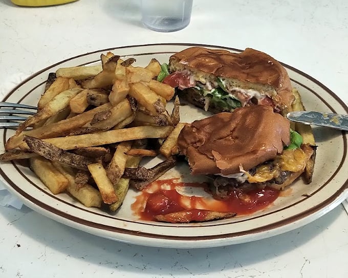 A burger that understands the assignment, with fries that clearly graduated from potato university with honors. Lunch that makes you question why breakfast gets all the glory.