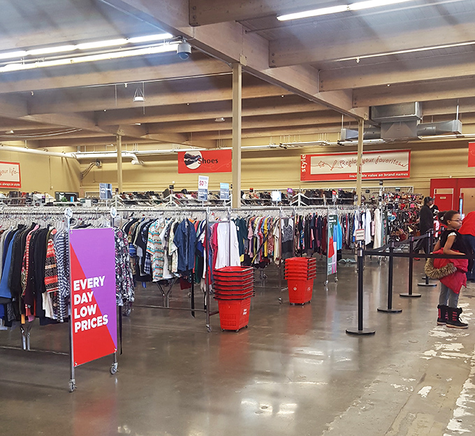 The retail runway stretches before you, red baskets standing ready for your selections like little chariots of thrifting victory.