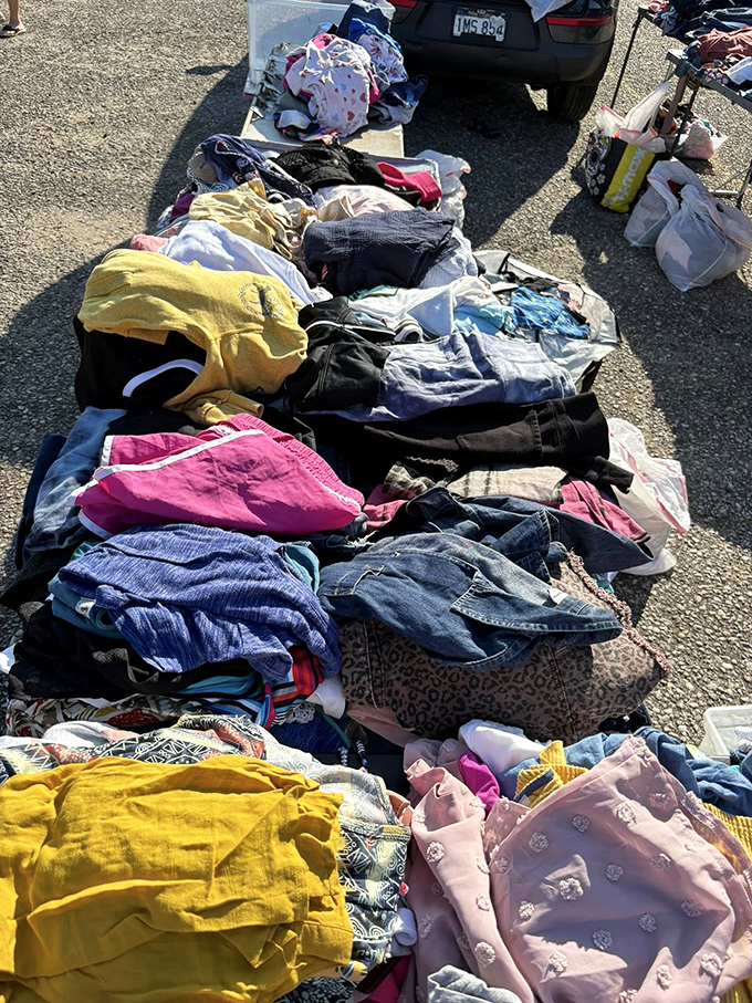 Textile treasure hunting at its finest! Dive into this fabric sea where vintage denim and forgotten fashions await their second chance at style.