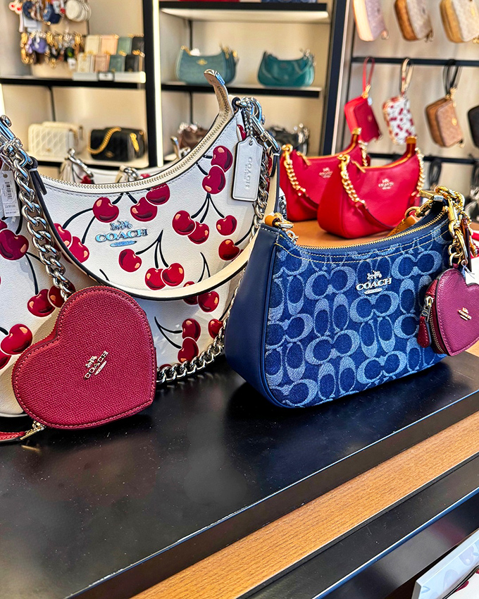 Coach's cherry-adorned purse collection proves accessories can be both whimsical and sophisticated&mdash;like dessert for your wardrobe.