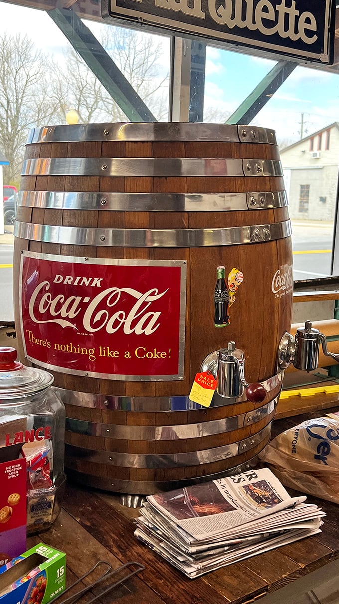 "There's nothing like a Coke!" proclaims this barrel dispenser, a wooden wonder that once turned ordinary gatherings into special occasions one fizzy pour at a time.