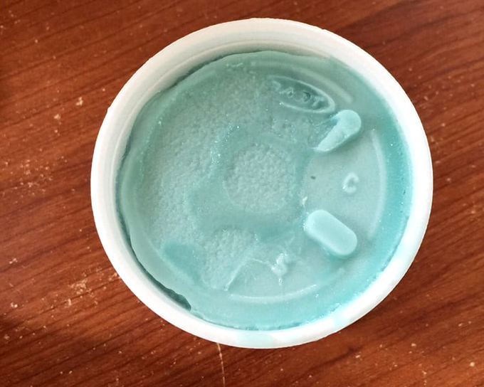 Blue coconut dessert that looks like it came from another planet but tastes like tropical paradise. The best kind of culture shock.