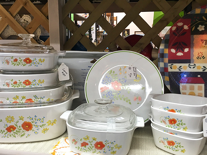Wildflower pattern CorningWare – the casserole dishes that survived thousands of potlucks and still look ready for another church basement gathering.