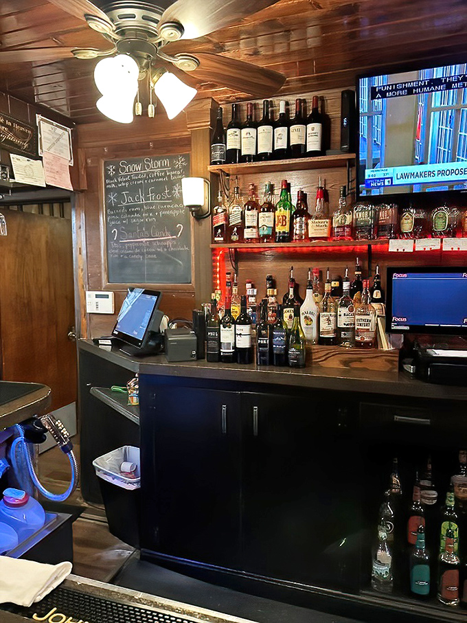 Behind this unassuming counter, cocktail magic happens without fanfare. The chalkboard specials and well-stocked shelves tell you everything you need to know&mdash;they take their drinks seriously.
