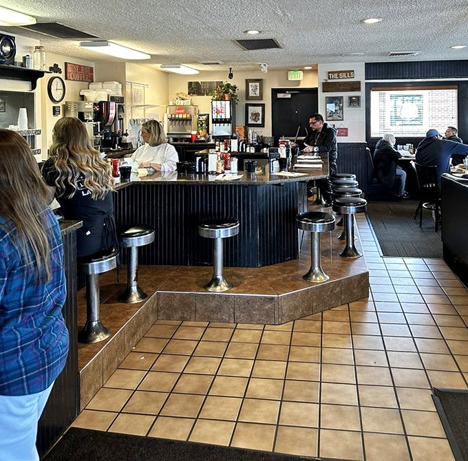 The counter seating isn't just efficient&mdash;it's dinner theater where regulars and rookies alike can watch short-order symphonies conducted with spatula batons.