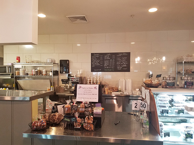 The counter area where magic happens, coffee flows freely, and pastries practically whisper your name from their baskets.