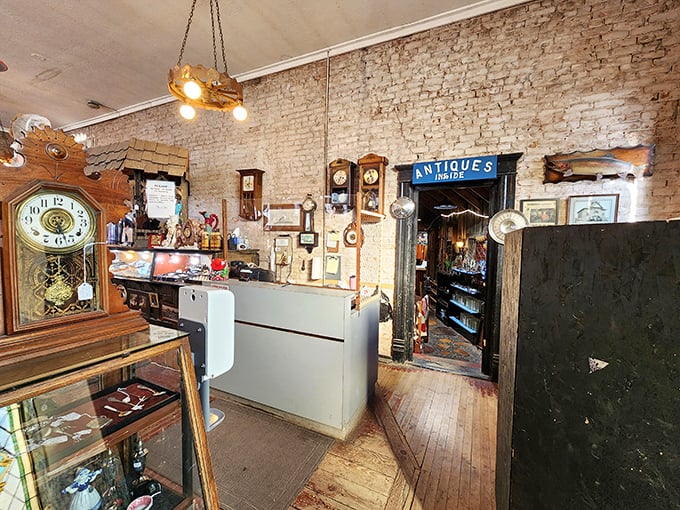 The checkout counter, where vintage clocks remind you how long you've been browsing and how many more treasures await in the "Antiques" room beyond.