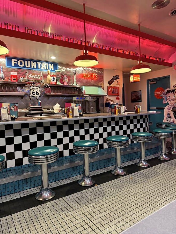 Classic diner counter culture alive and well&mdash;checkered tiles, fountain drinks, and the promise of malts made the way your grandparents remember them.