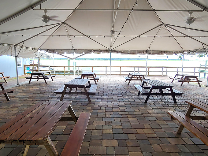 The covered patio&mdash;where picnic tables await your seafood feast, protected from Florida's unpredictable weather patterns.