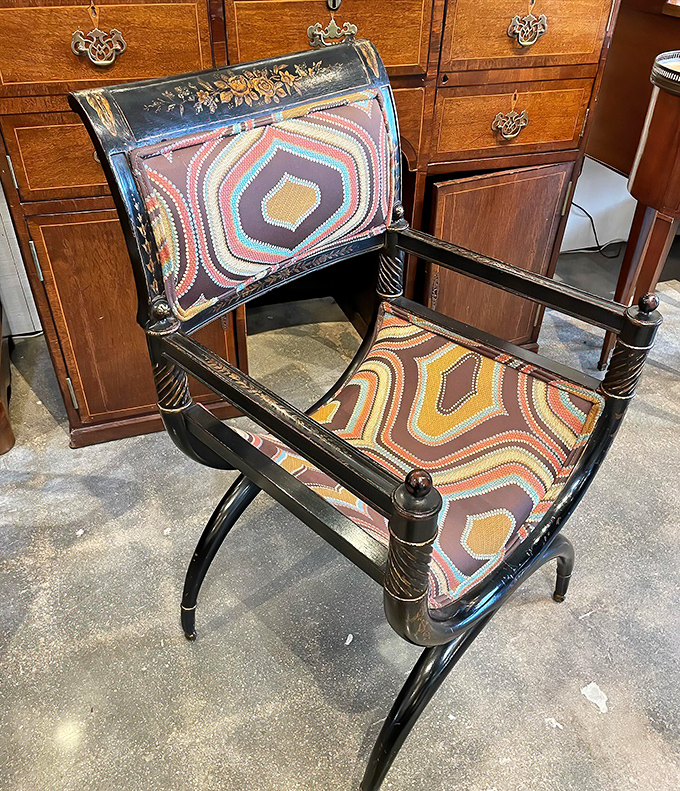 This curule-style chair with its geometric fabric is what happens when ancient Rome meets 1970s pattern design. Surprisingly, they get along famously. 