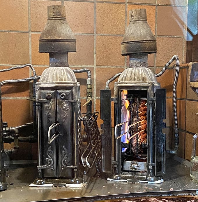 The century-old vertical cast-iron broilers cook meat between two flames, a method so perfect it's never needed updating or improvement.