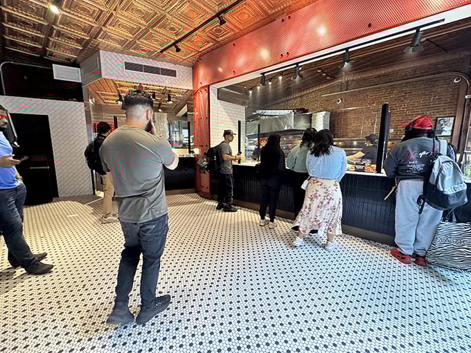 The line forms for a reason. These customers aren't just waiting&mdash;they're participating in a New York ritual as authentic as complaining about the subway.