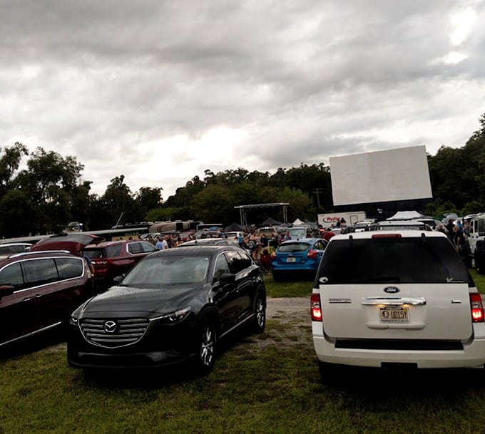 Movie night at Joy-Lan is a community affair, with families setting up chairs alongside their vehicles for the perfect viewing experience.