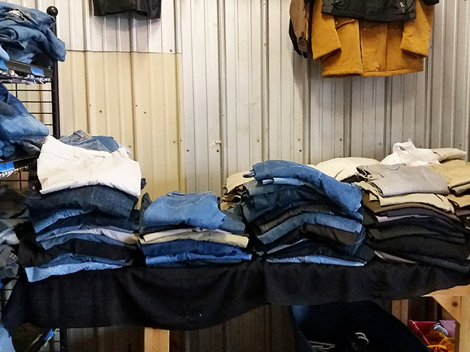 Denim mountain! The universal uniform of casual America stacked in every wash and size imaginable &ndash; no fitting room required, just optimism.