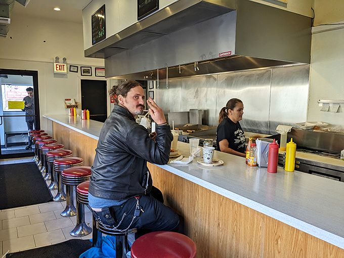 Every stool tells a story at Diner Grill. From night shift workers to morning commuters, this counter democratizes deliciousness for all.