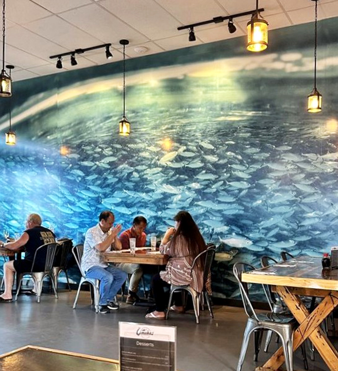 The spectacular ocean mural serves as both art and appetite stimulant &ndash; dining with the feeling of being surrounded by schools of fish.