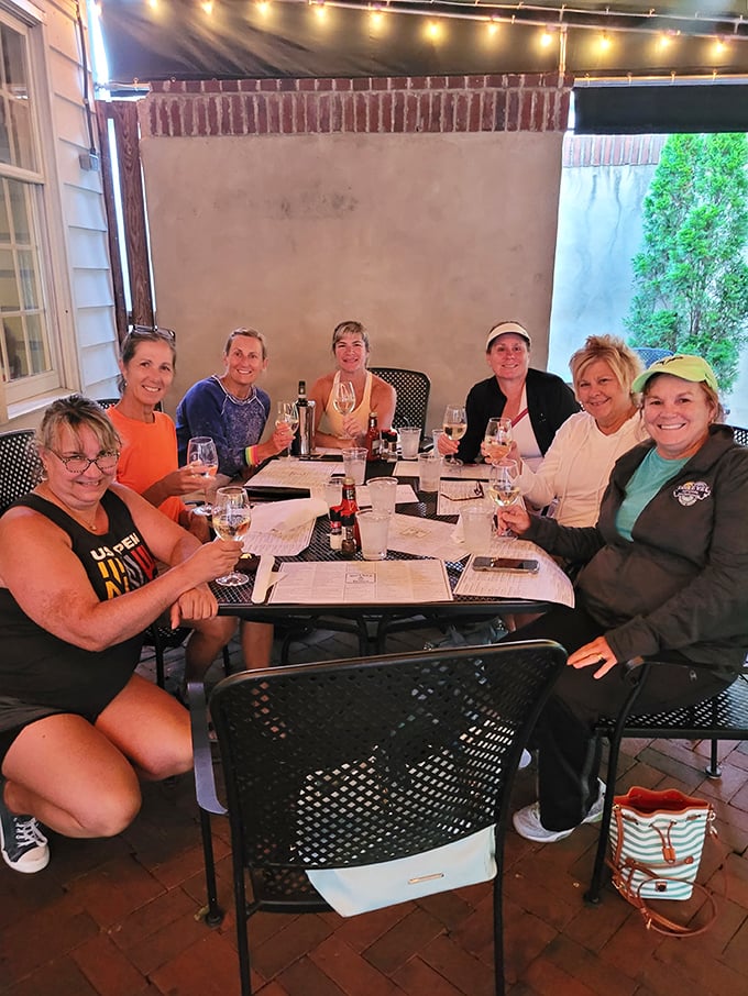 The patio brings together friends who raise glasses in that universal gesture that says "life is good when shared over good food."