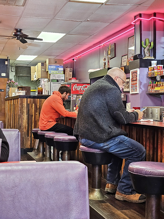 Counter seating isn't just efficient—it's community building, where strangers become neighbors over coffee and conversation.