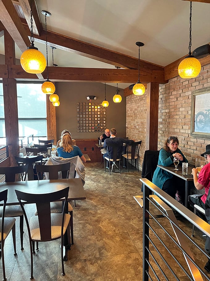 Warm amber pendant lights cast a glow that makes everyone look like they're starring in their own food documentary. Ready for your close-up?