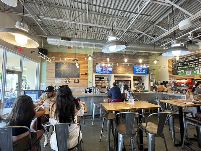 A bustling dining room where strangers become temporary family, united by the universal language of "mmm" and "you've got to try this."