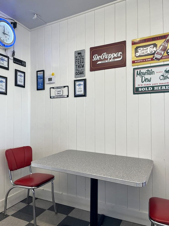 Vintage soda signs and red chairs create the perfect backdrop for burger enjoyment. No Instagram filters needed &ndash; this place is authentically itself.