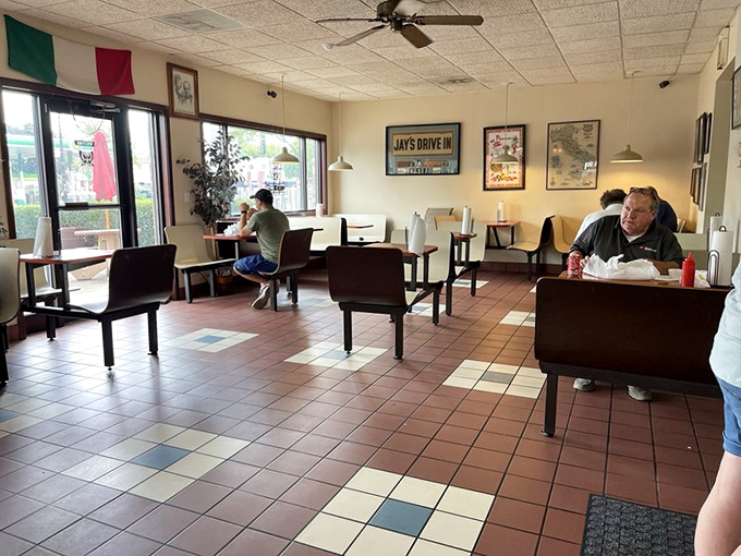 Simple tables, ceiling fans, and Italian flag colors create the perfect backdrop for the real star&mdash;the food that keeps Chicagoans coming back decade after decade.