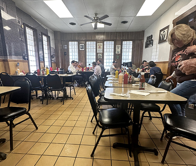 The dining room hums with the satisfied murmurs of customers who've just discovered what a proper deli experience should be.