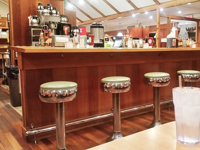 The counter seating&mdash;where solo diners become breakfast philosophers and coffee refills flow like profound conversation.