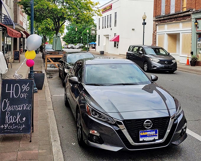 Downtown shopping becomes an adventure with colorful storefronts and sidewalk sales inviting visitors to discover local treasures.