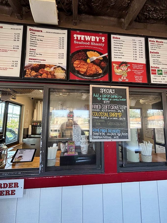 The menu board tells all: homemade desserts, colossal shrimp, and fried soft crab&mdash;a delicious roadmap to seafood happiness.