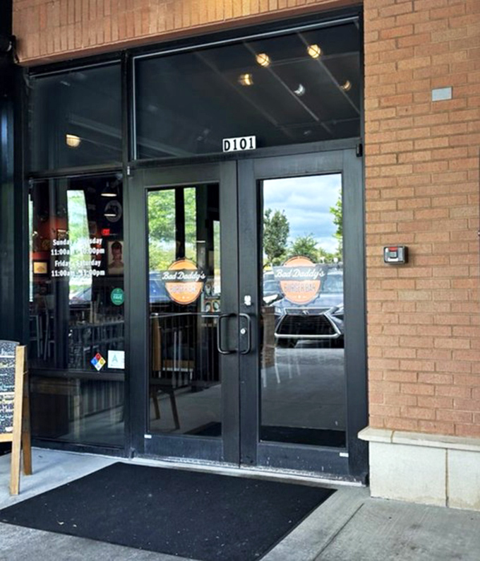 The entrance beckons like a portal to flavor town. That door handle has been grabbed by thousands of soon-to-be-satisfied customers.