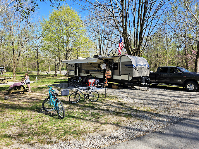 Family memories take shape at campsites where bicycles, barbecues, and temporary homes create neighborhoods among the trees.
