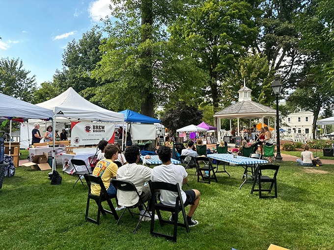 The farmers market transforms an ordinary park into the town's living room, complete with music, conversation, and the freshest produce money can buy.