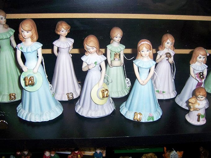 Porcelain figurines lined up like tiny debutantes, each with a number that doesn't begin to capture their delicate charm or collectible appeal.