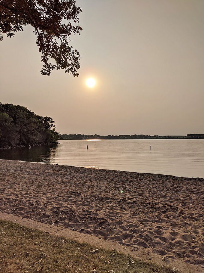 Golden hour serenity at the shore. When the sun starts to set at Lake Herman, even the most dedicated scrollers put down their phones.