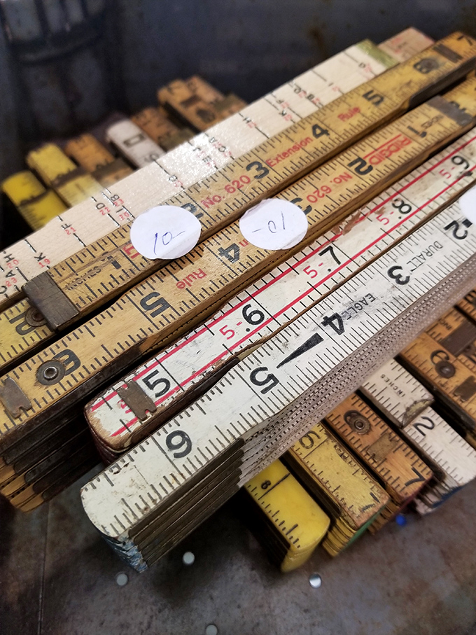 Vintage folding rulers marked with the honest wear of craftsmen who measured twice and cut once. Analog precision at just a dollar each.