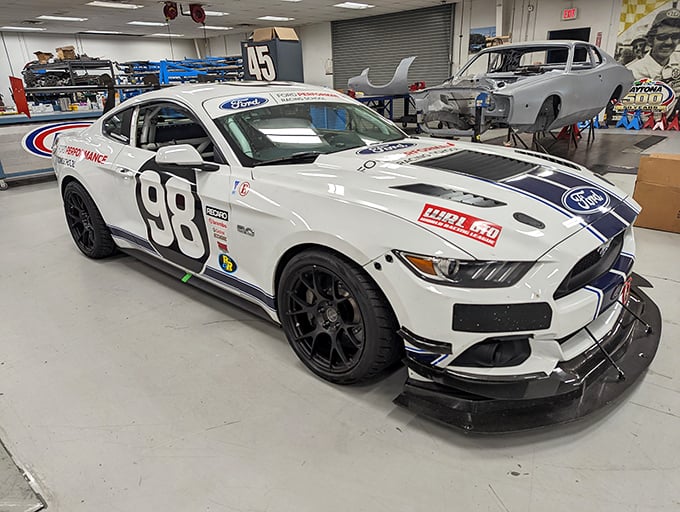 Racing's future meets its past. This modern Ford Mustang GT4 shows how the sport continues to evolve.