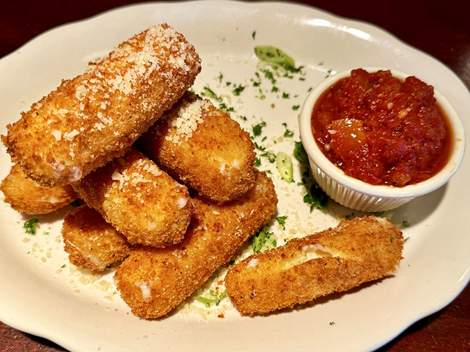 Fried mozzarella sticks that actually deliver on their golden promise&mdash;crispy outside, melty inside, and worth every napkin.